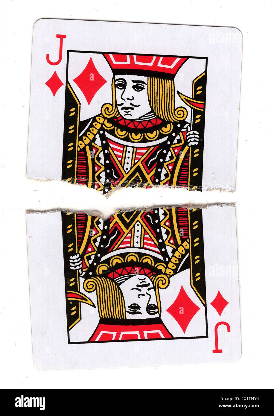 A jack of diamonds playing card torn in half on a white background ...