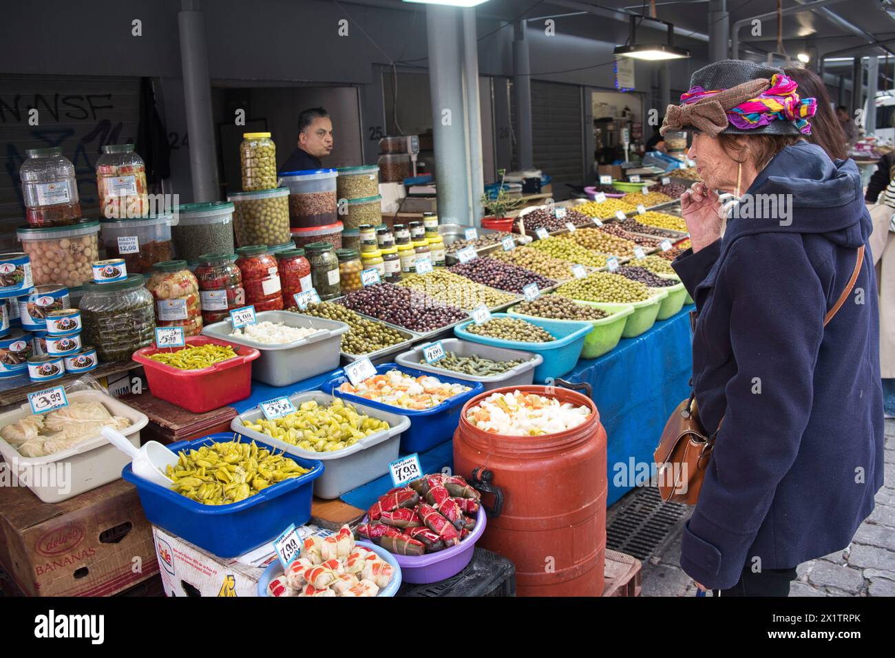 Woman shopper by the olive food market stall in central Athens Stock ...