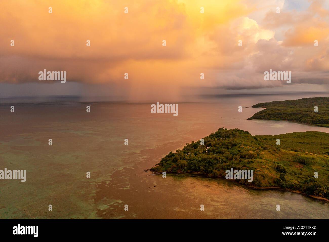 Dramatic view of rain clouds over the ocean. Black and yellow clouds ...
