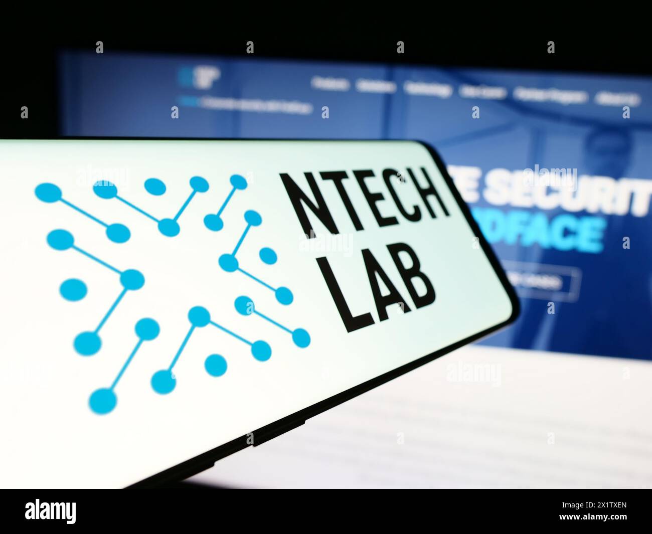 Cellphone with logo of Russian facial recognition company NtechLab (Findface) in front of ...