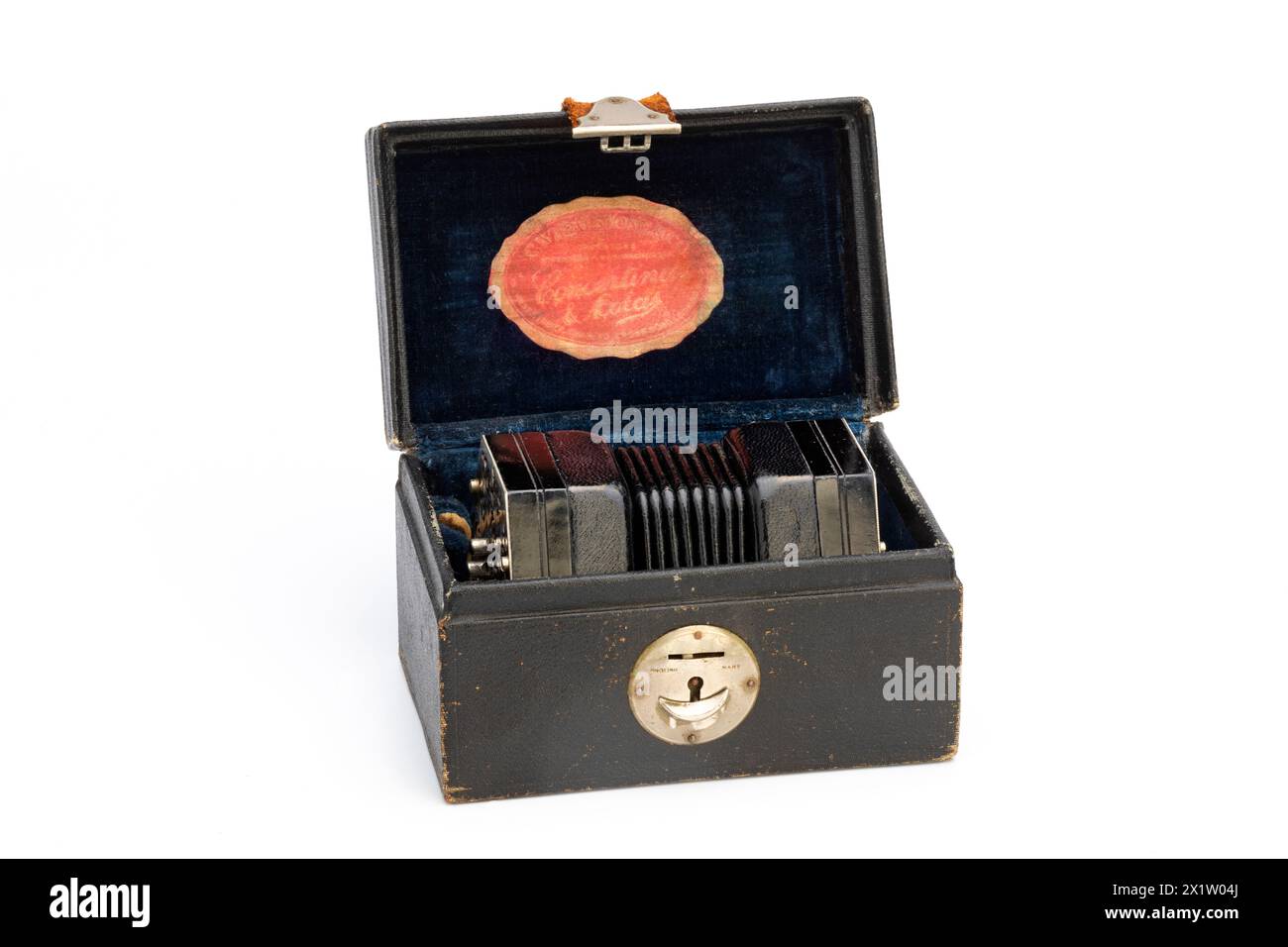 The open box for a CW Wheatstone miniature Concertina showing the lable ...
