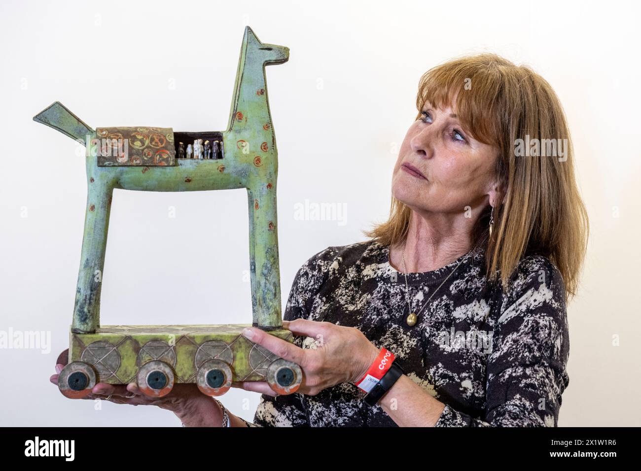London, UK. 18 April 2024. Artist Louise Bell with one of her works at ...