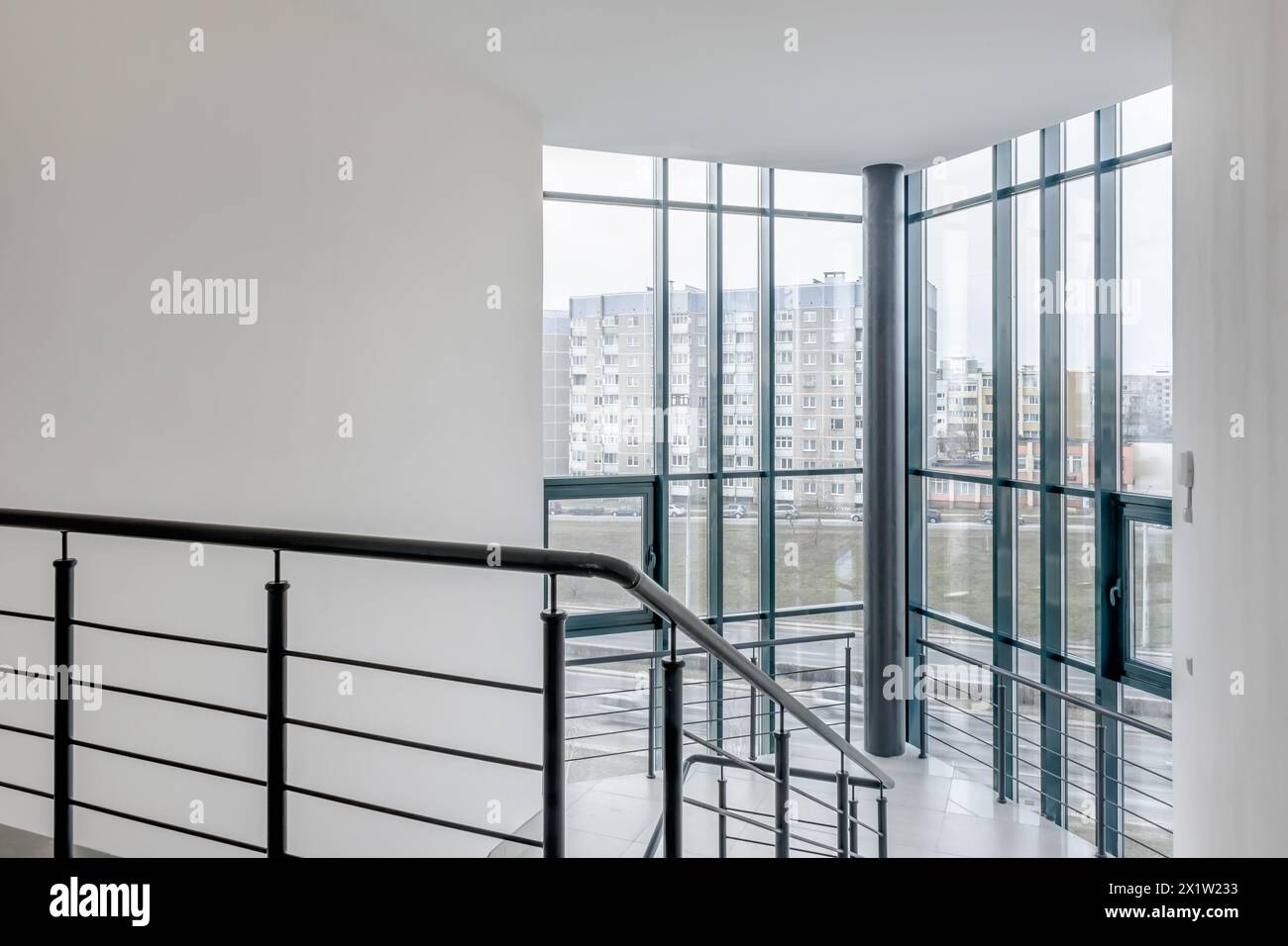panorama view in empty modern hall with columns, doors, stairs and ...