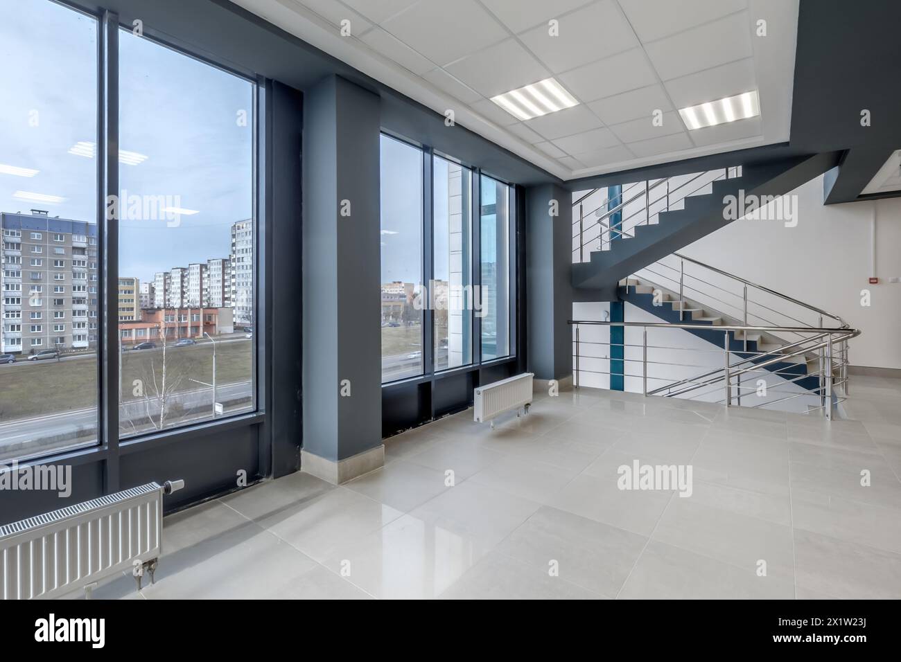 panorama view in empty modern hall with columns, doors, stairs and ...