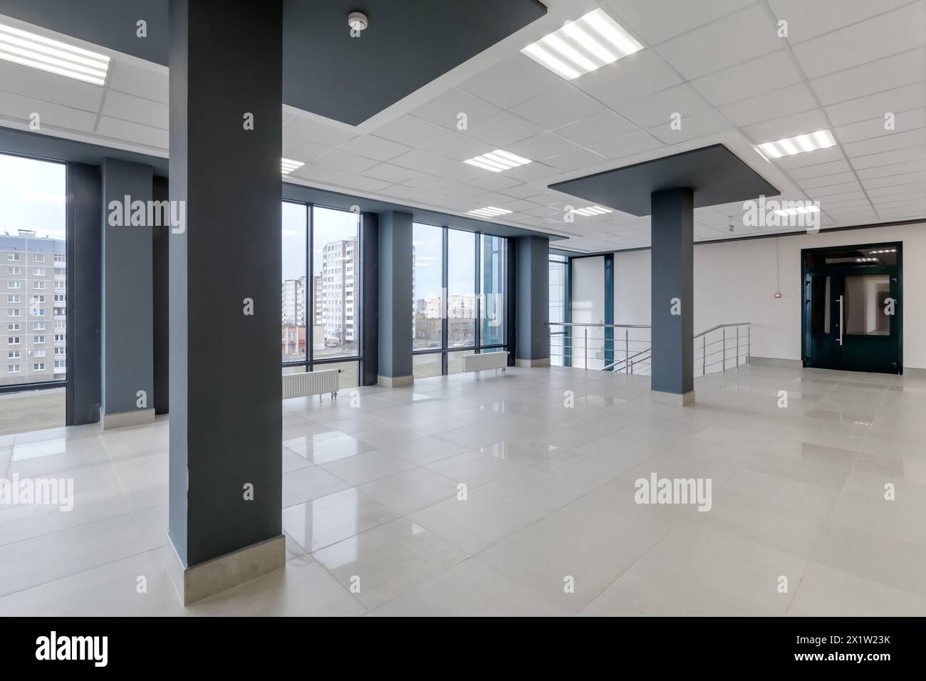 panorama view in empty modern hall with columns, doors, stairs and ...