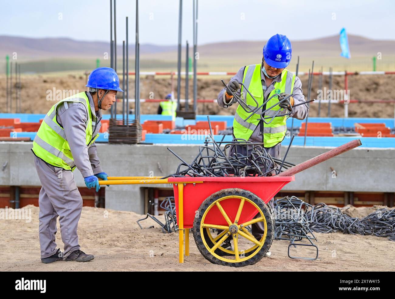 XILINGOL, CHINA - APRIL 18, 2024 - Builders work at the construction ...