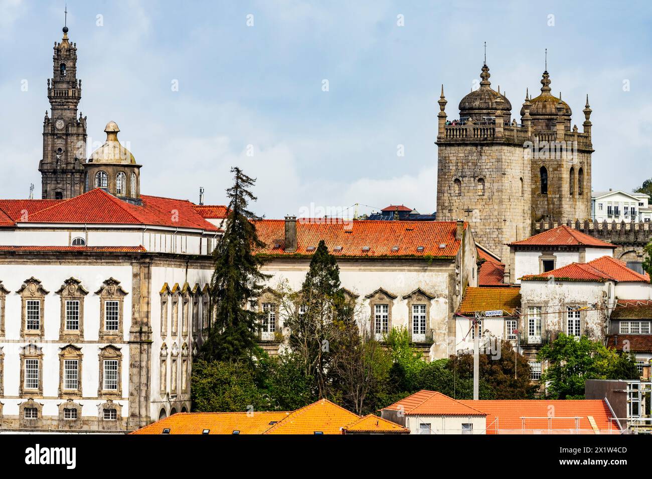 Colorful cityscape of Porto historic centre with rooftops and church ...
