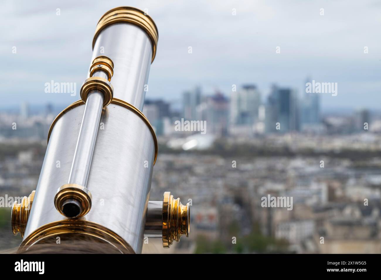 Telescope, view from the Eiffel Tower to the skyscrapers of La Defence ...