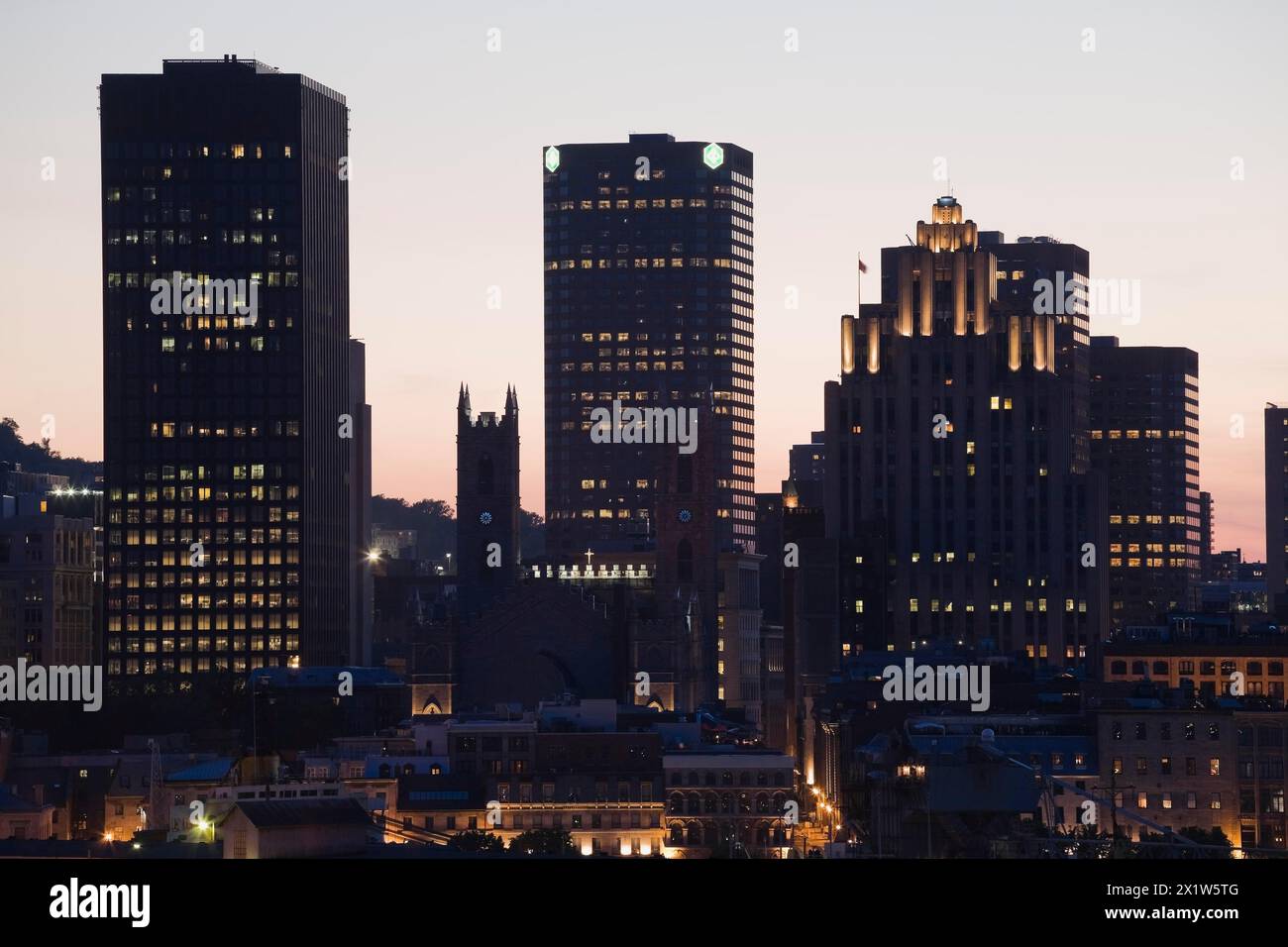 Silhouetted buildings and historic Notre-Dame basilica, art deco Aldred ...