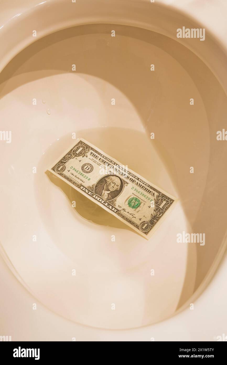 Top view and close-up of US one dollar bank note thrown down and ...