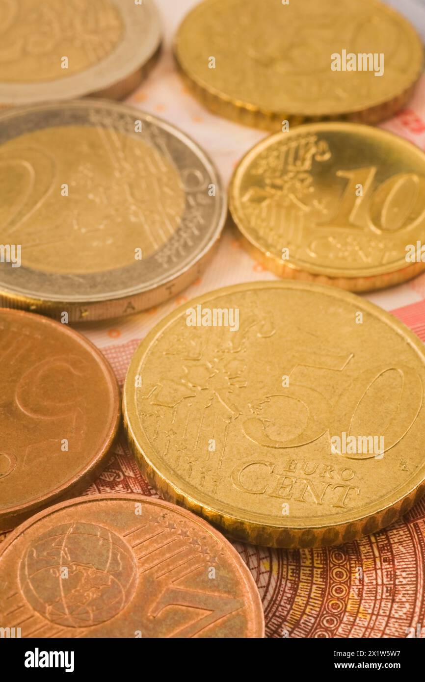Close-up of gold and copper colored assorted five, ten, fifty Euro cent ...