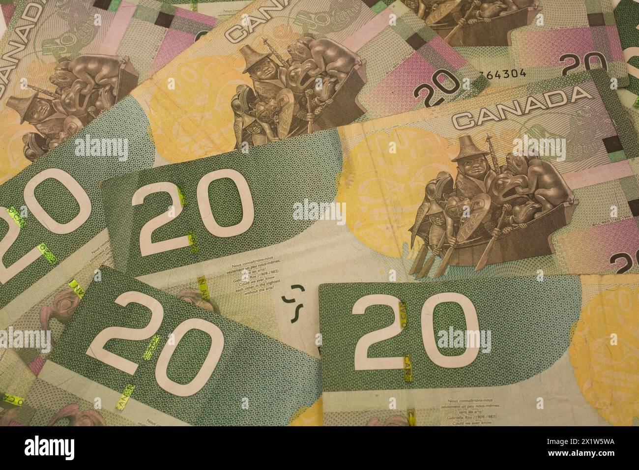 Close-up of reverse side of green, yellow, white, brown and pink ...