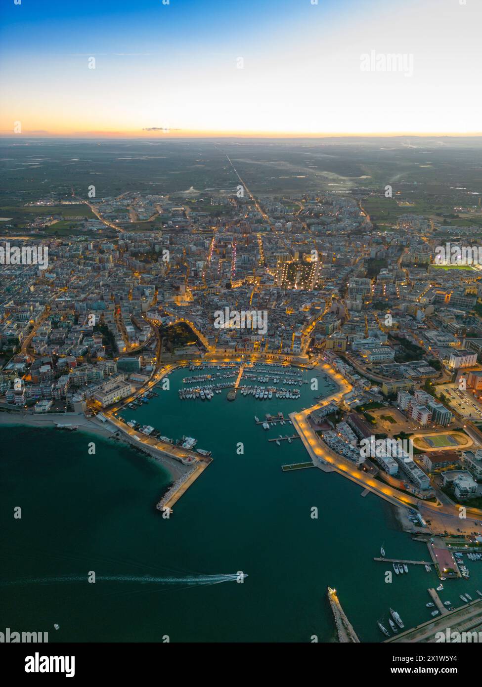 Aerial view of seafront and old town Bisceglie in Puglia with drone on ...