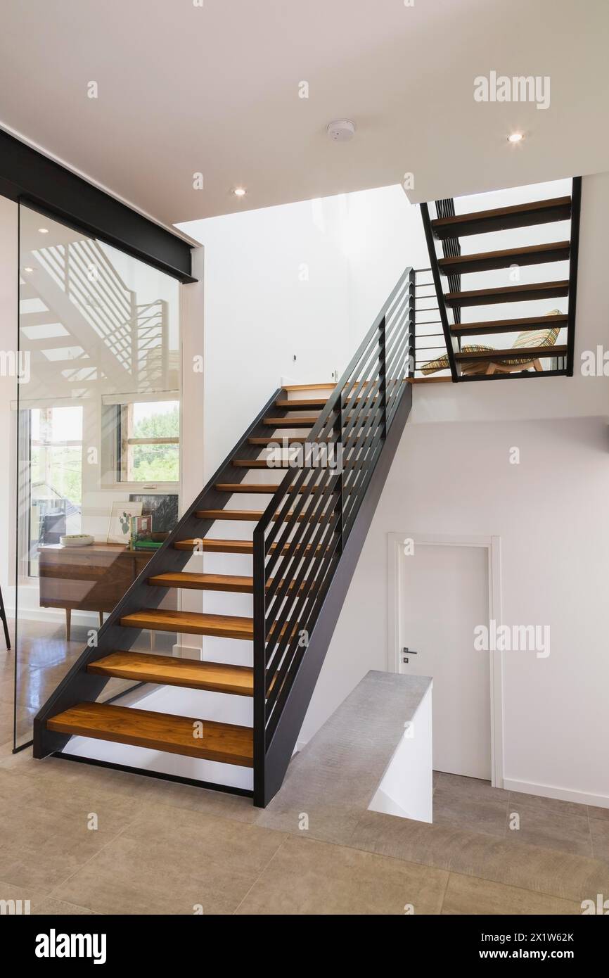 American walnut wood and black powder coated cold rolled steel stairs ...