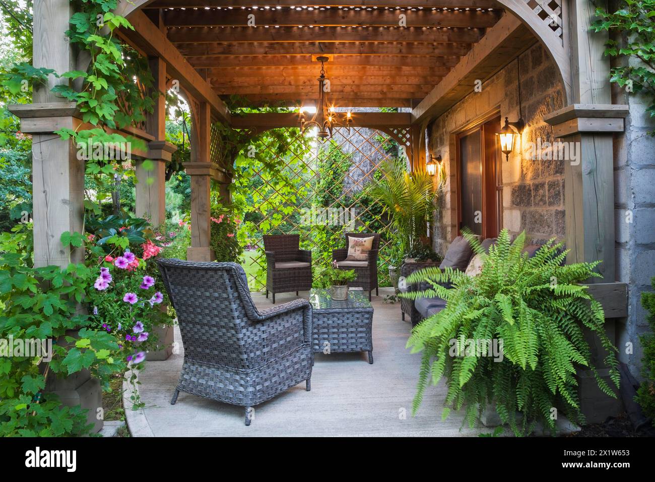 Rear of Renaissance grey stone and mortar castle style home with ...