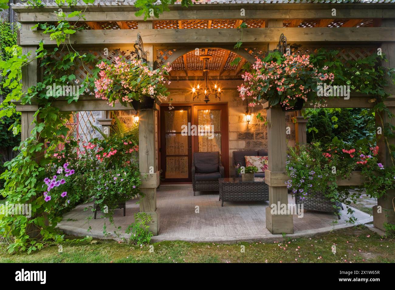 Rear of Renaissance grey stone and mortar castle style home with ...