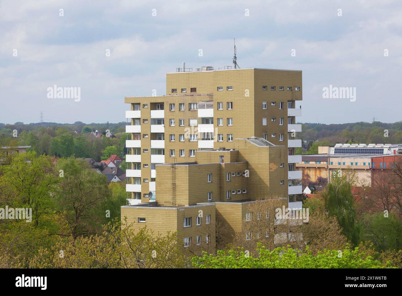 Bird's eye view of a modern, monotonous residential building in spring ...