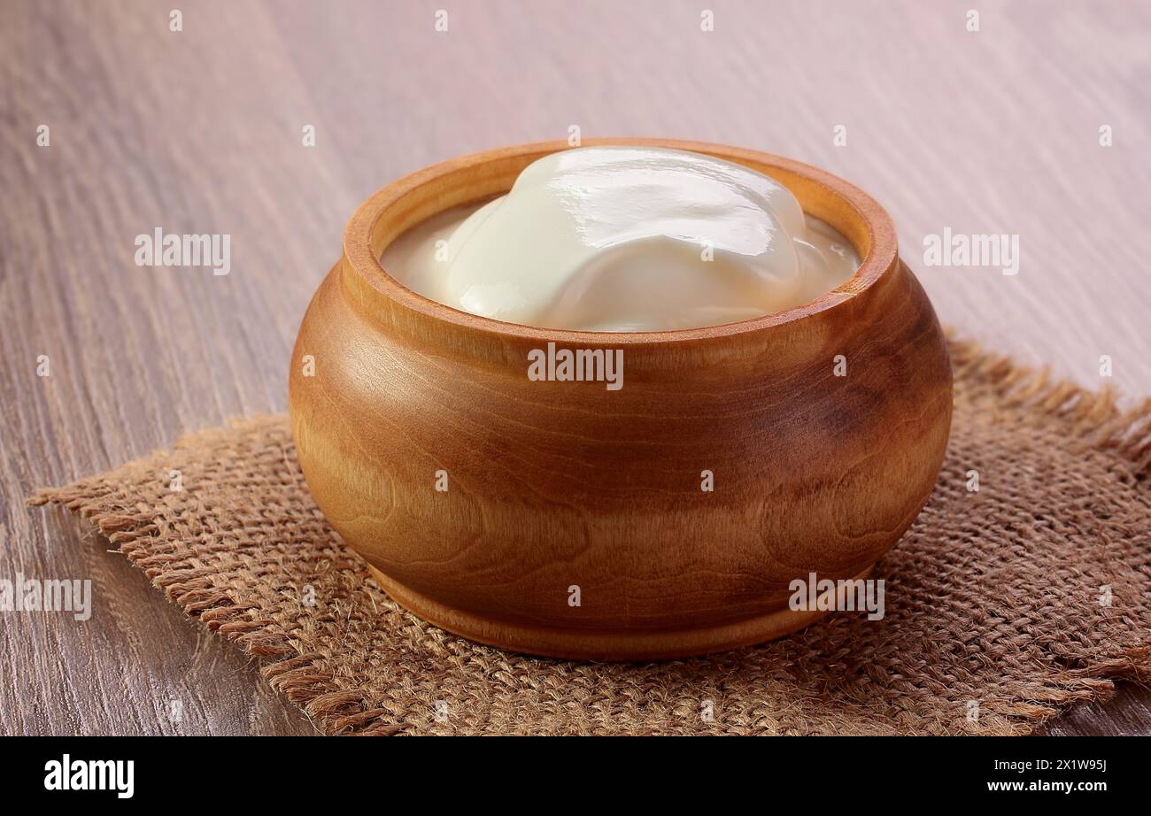 Cream sour, dairy products in a bowl isolated white background Stock ...