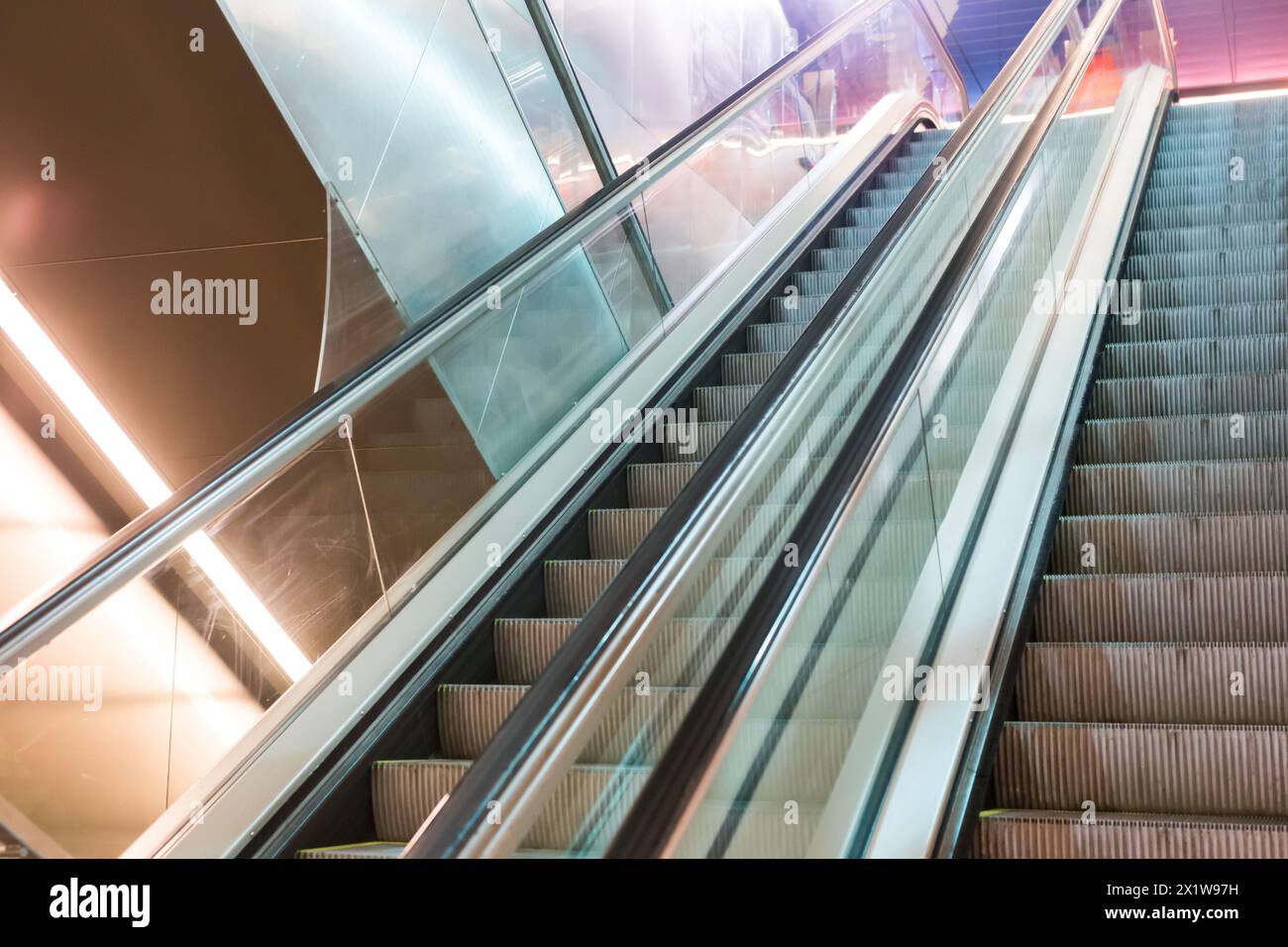 Line escalators with metal coating Stock Photo - Alamy