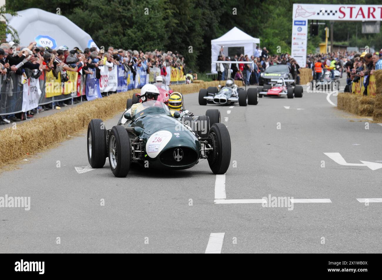 A historic racing car passes the crowd at a motorsport event, SOLITUDE ...