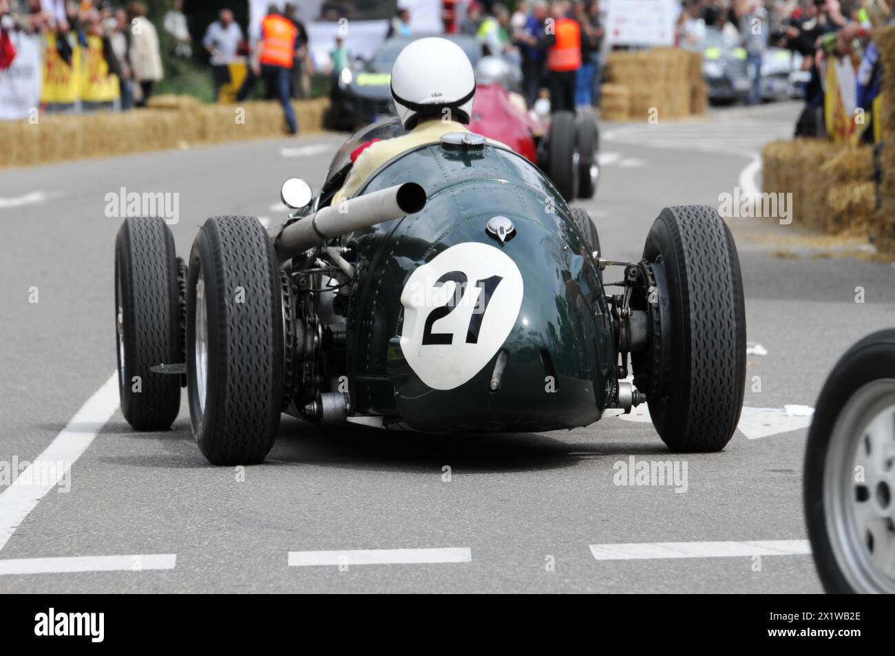A historic racing car with the number 21 on a race track, SOLITUDE ...