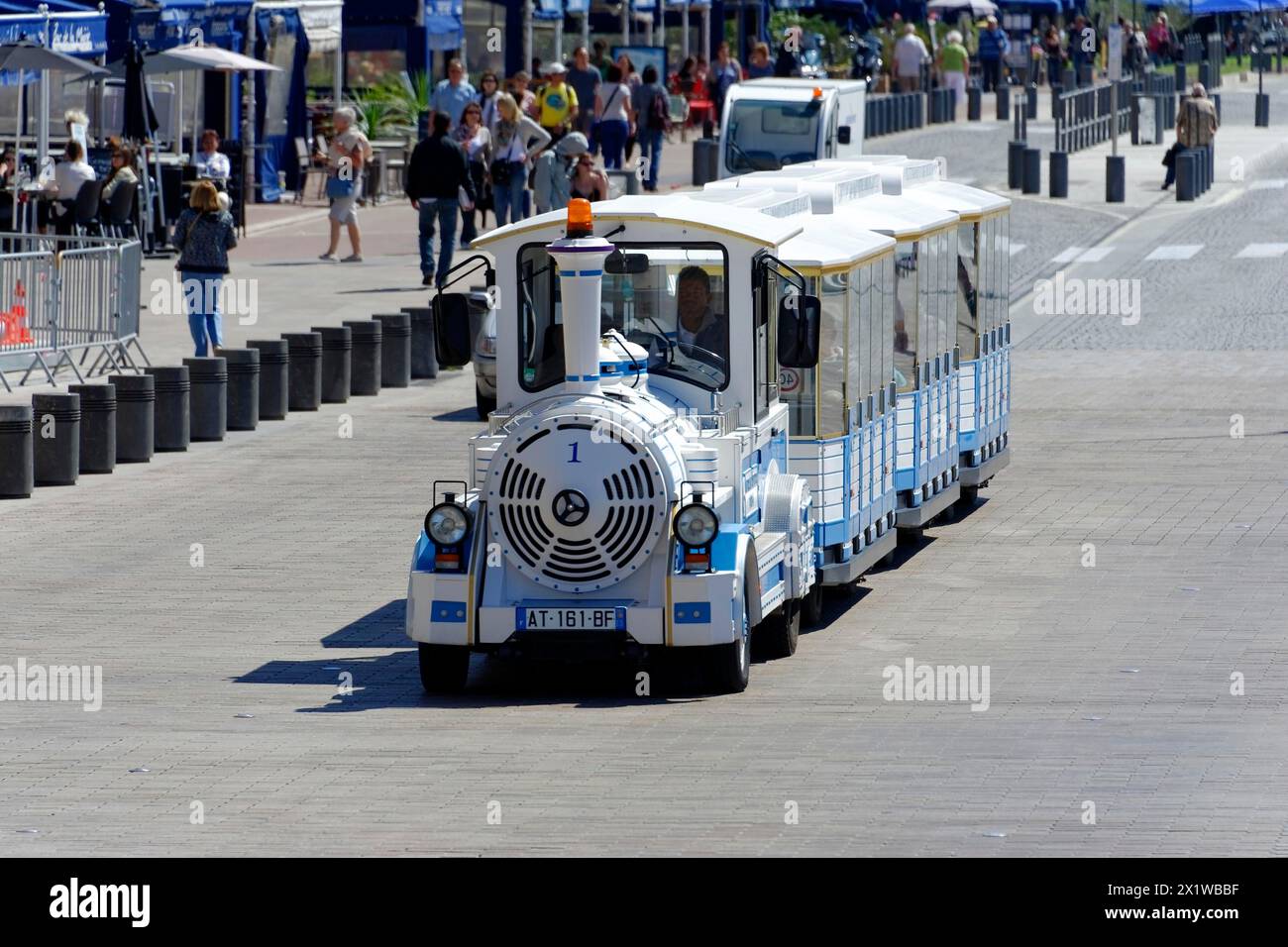 Marseille, Blue and white tourist train travelling on a promenade ...