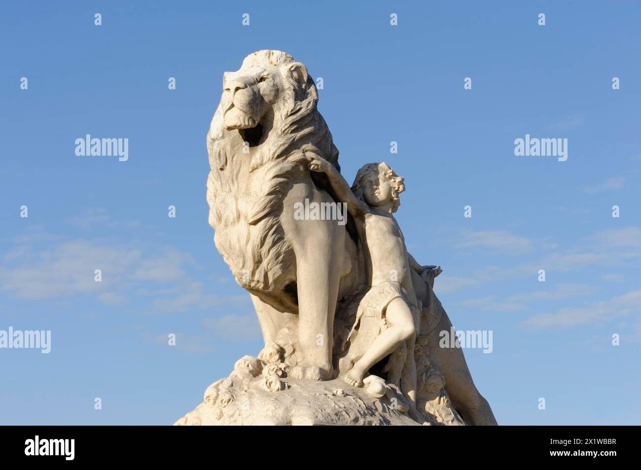 Marseille, White marble sculpture of a lion and a woman in front of a ...