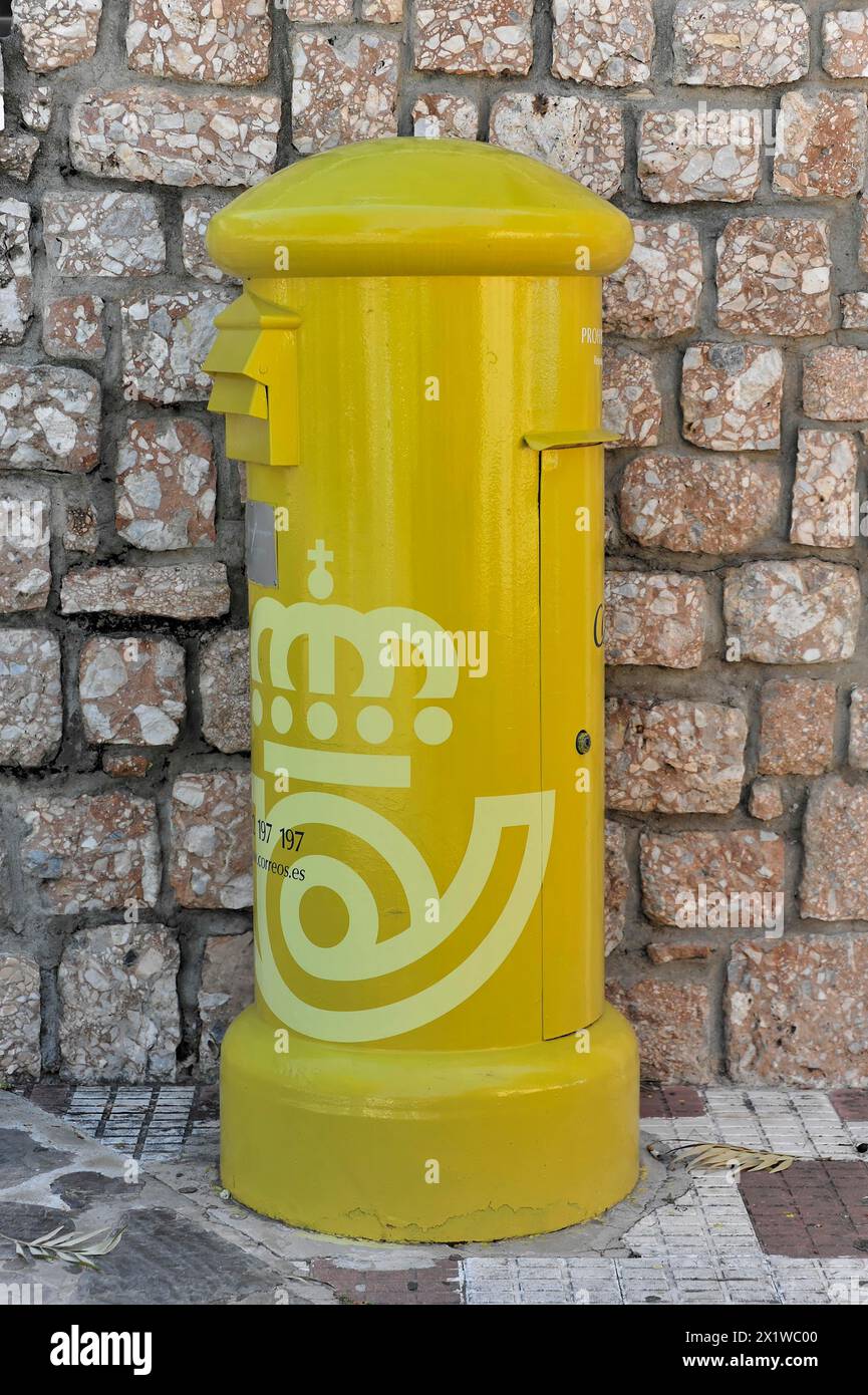 Solabrena, light yellow Spanish letterbox with symbols of the Spanish ...