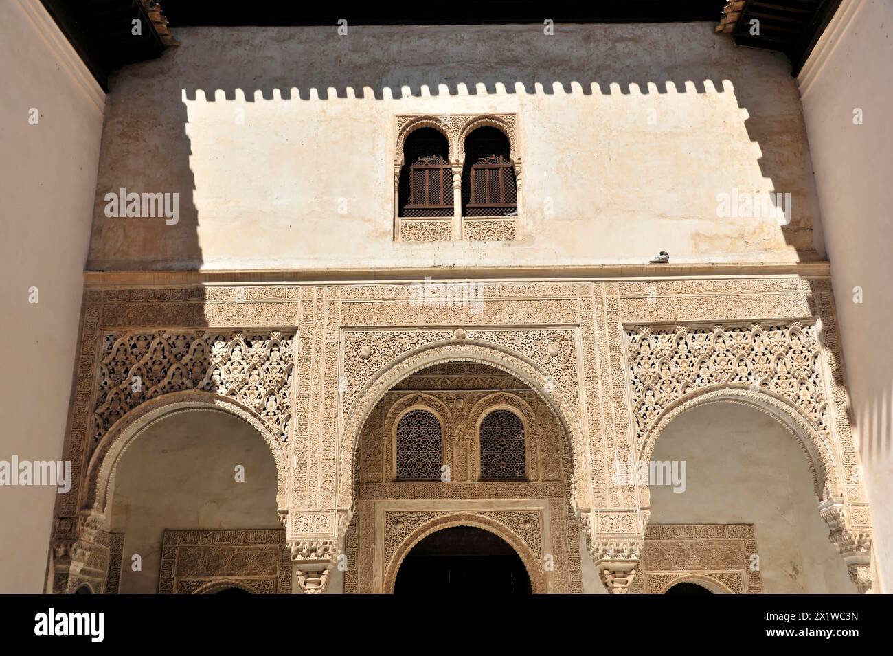 Artistic stone carvings, Alhambra, Granada, View of a Moorish courtyard ...