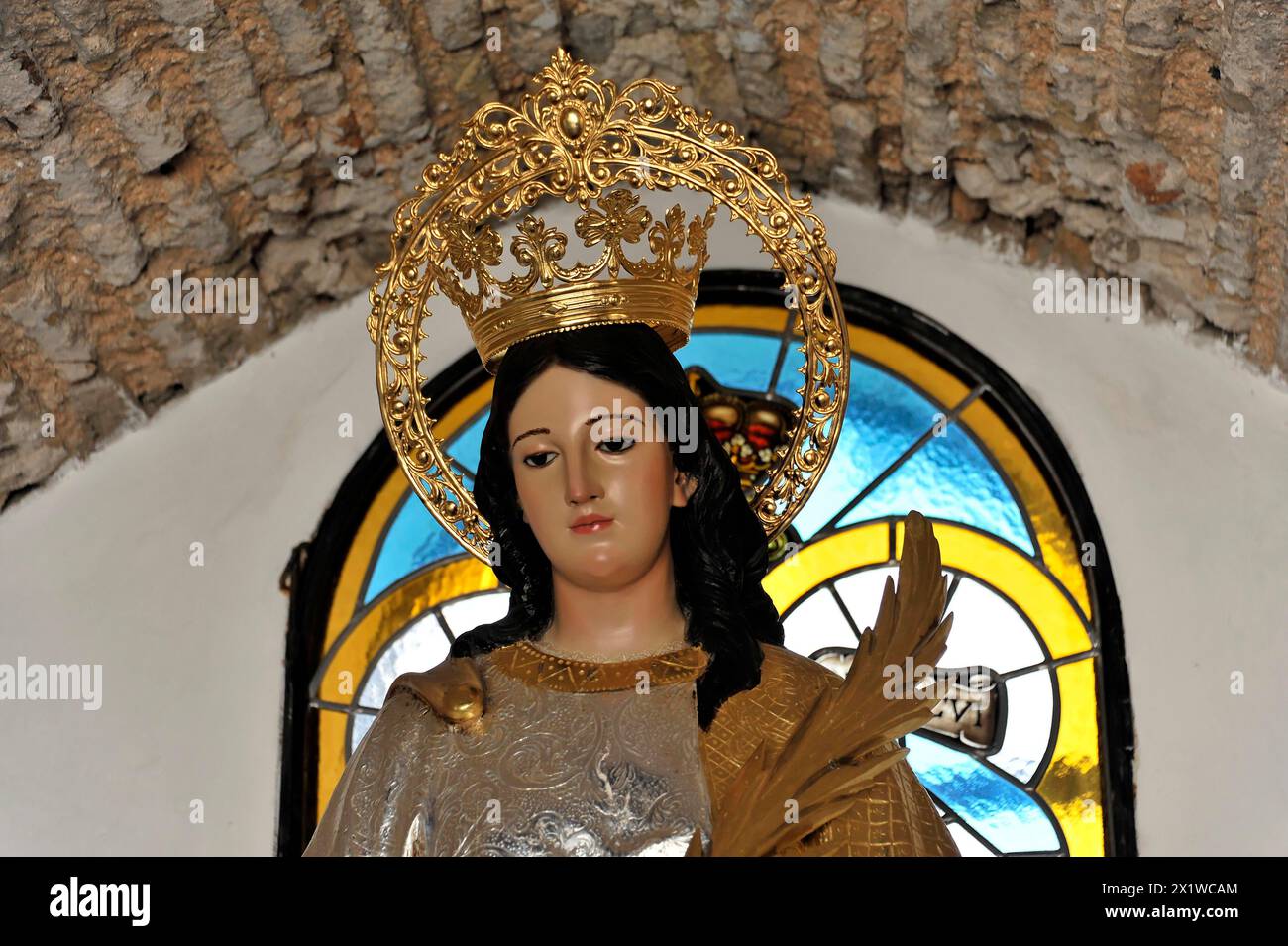 Castillo de Santa Catalina in Jaen, A statue of a crowned saint with a ...