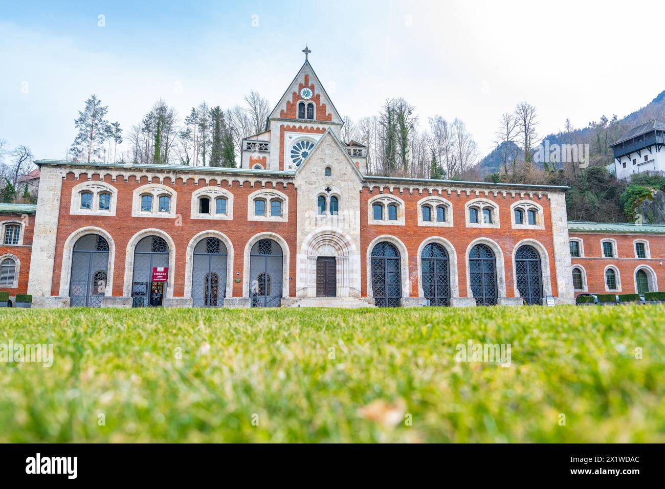 Front view of an architecturally remarkable building with brick facade ...