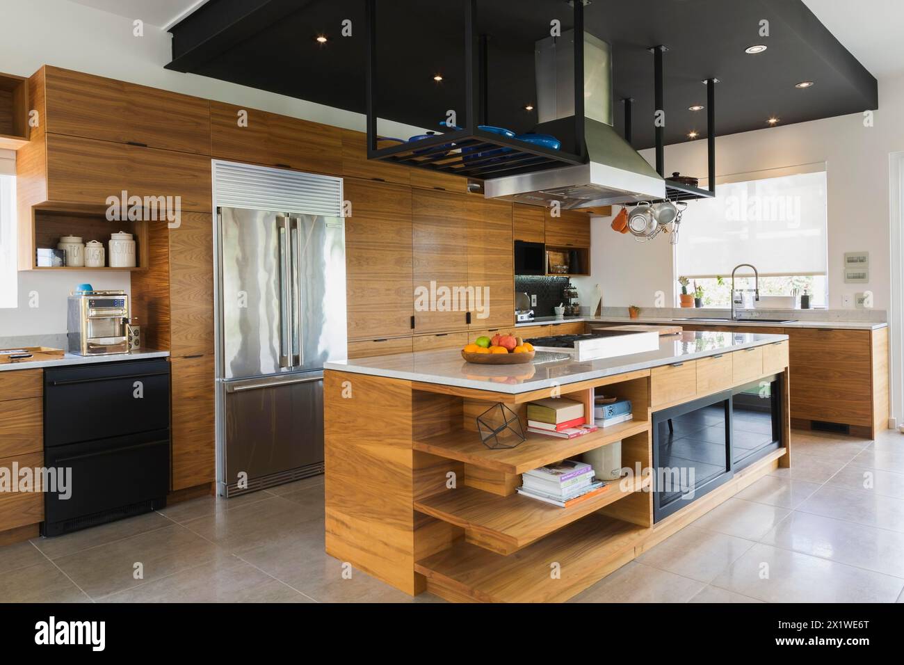 Kitchen with quartzite and walnut island hi-res stock photography and ...