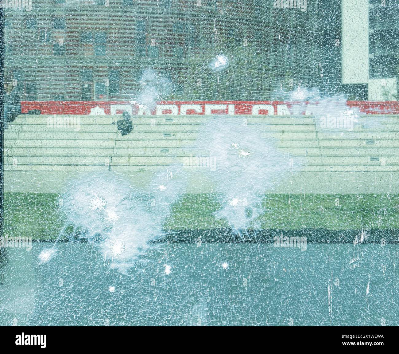 Cracked glass of a laminated glass pane Stock Photo - Alamy