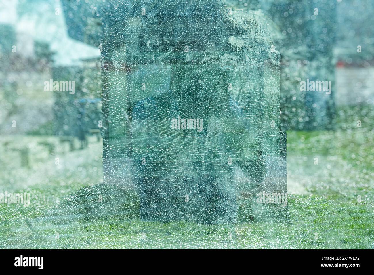Cracked glass of a laminated glass pane Stock Photo - Alamy