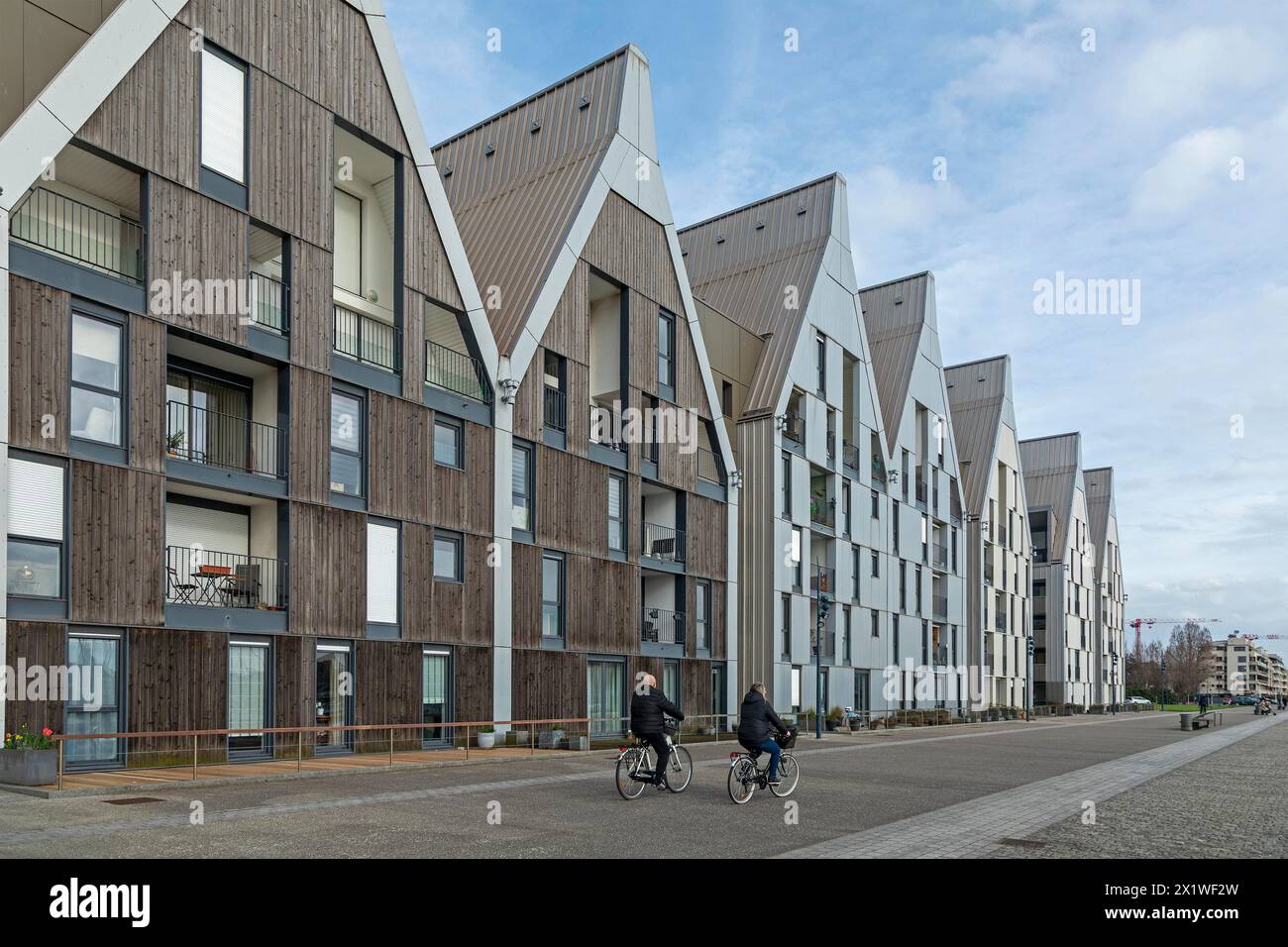 Modern architecture in the harbour, houses, people, Dunkirk, France ...
