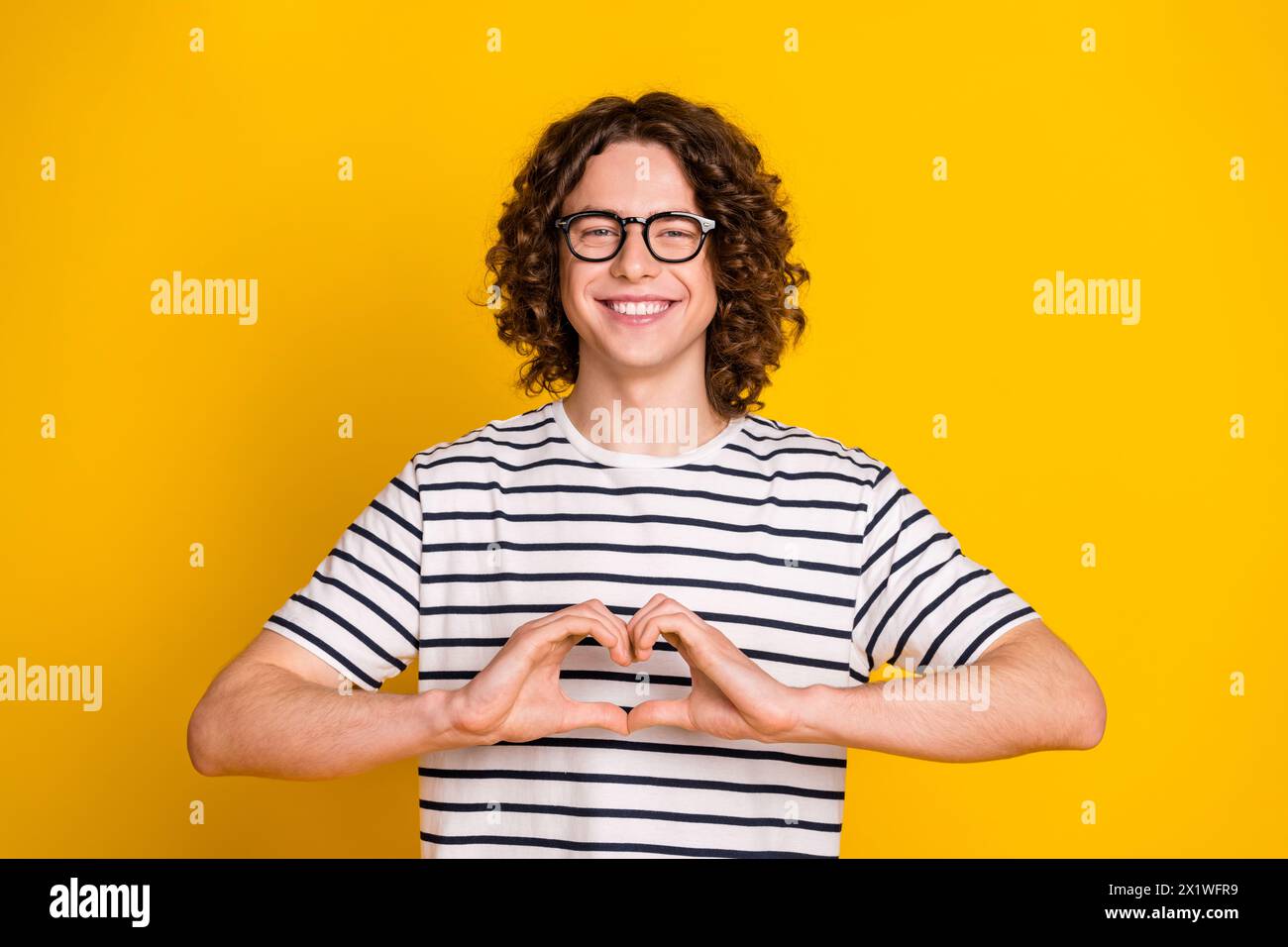 Portrait of young macho smiling guy teenager boyfriend showing ...