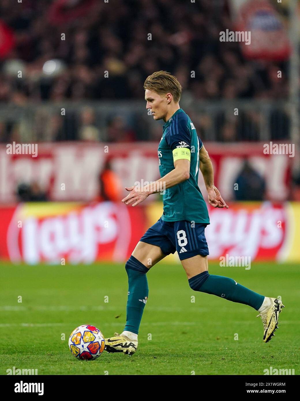 Munich, Germany, April 17th 2024: Martin Odegaard (8 Arsenal) controls ...
