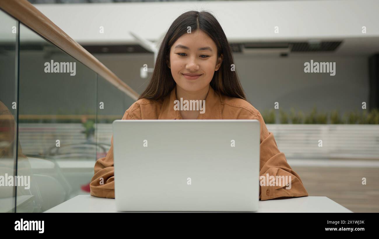 Girl opening laptop start working hi-res stock photography and images ...