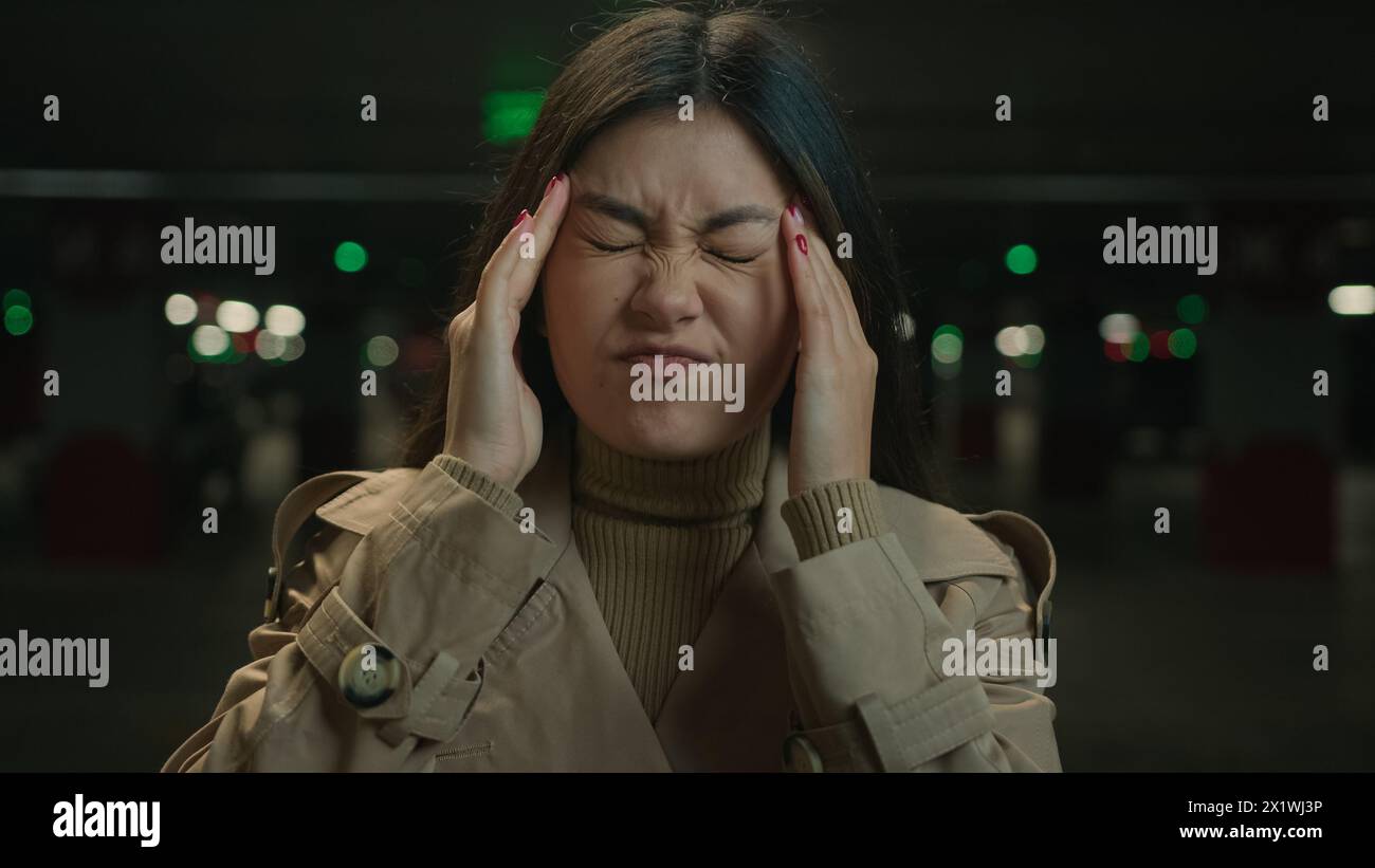 Asian unwell unhealthy sick woman suffer pain headache painful head ...