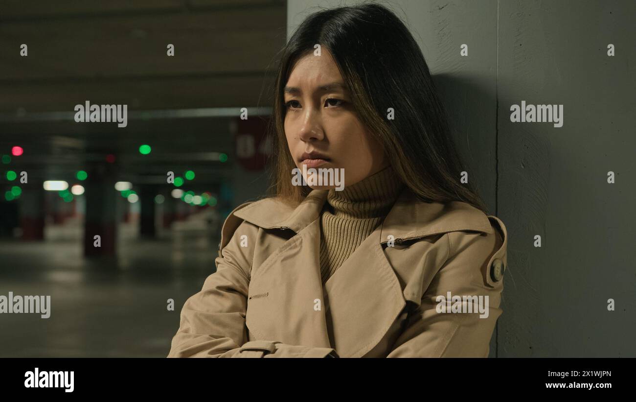 Upset anxious stressful Asian chinese woman female girl alone in car ...