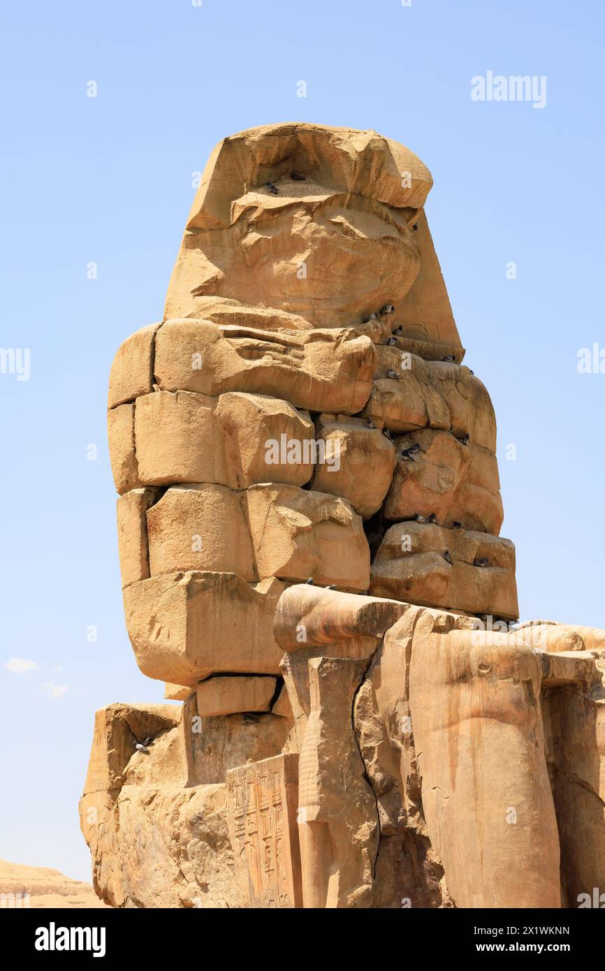The giant Colossi of Memnon. All that remains of the Temple of ...