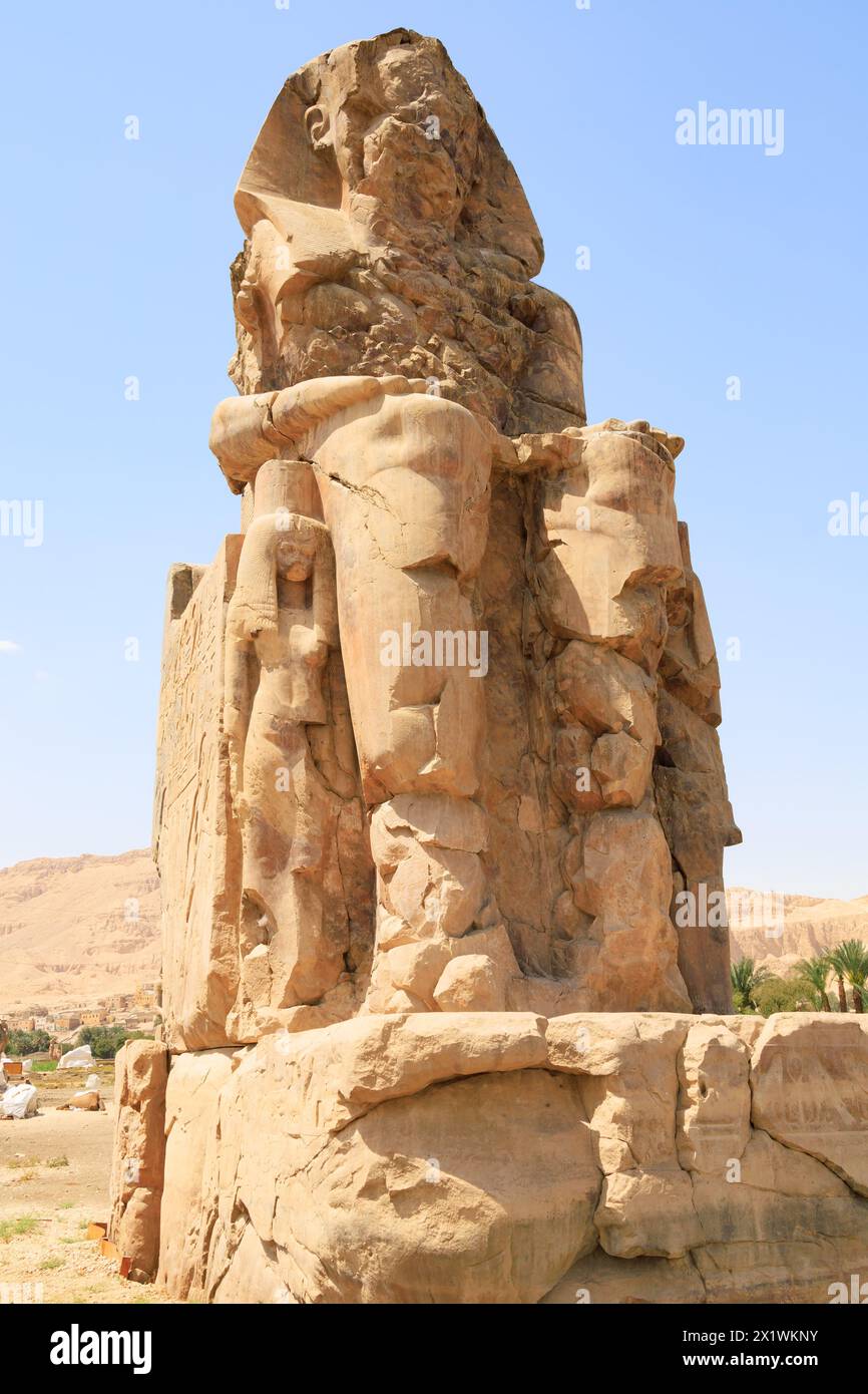 The giant Colossi of Memnon. All that remains of the Temple of ...