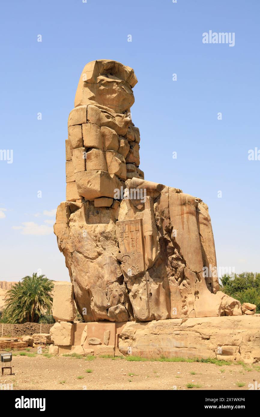 The giant Colossi of Memnon. All that remains of the Temple of ...