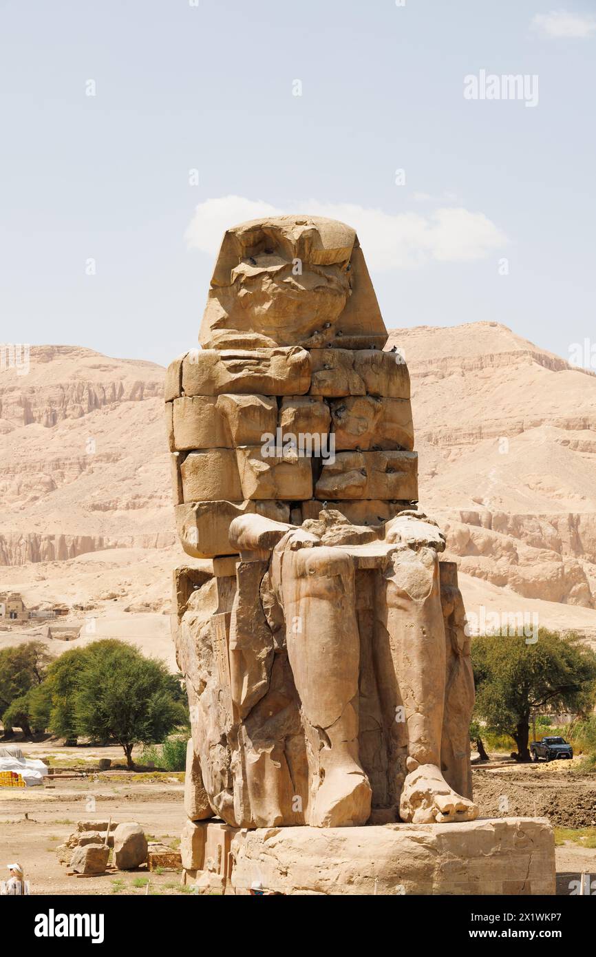 The giant Colossi of Memnon. All that remains of the Temple of ...