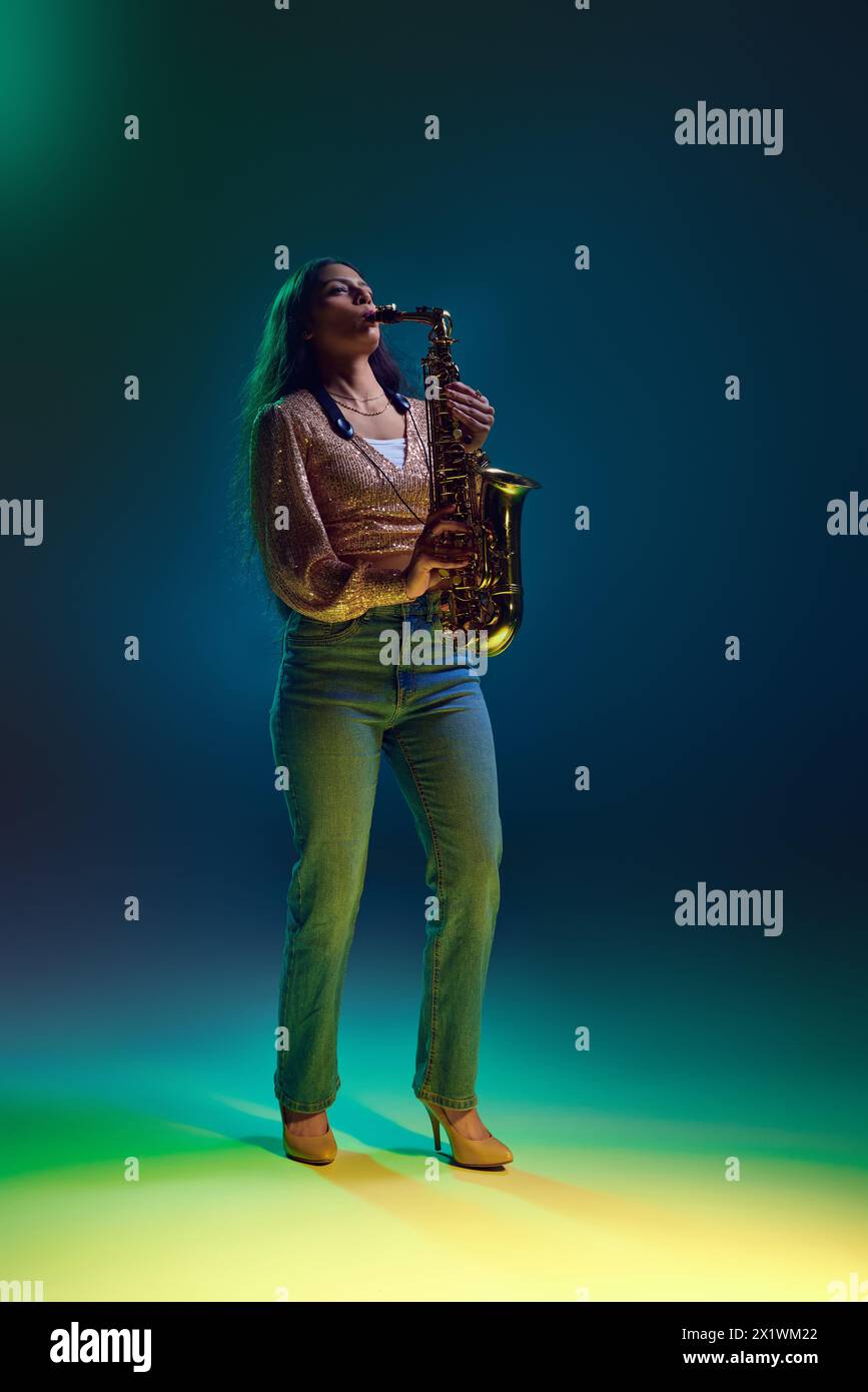 Side view photo of Indian woman, saxophonist performing solo in neon ...