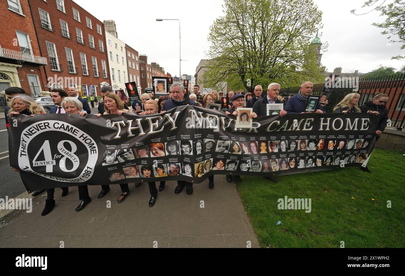 Family members walk to the Garden of Remembrance in Dublin after a ...