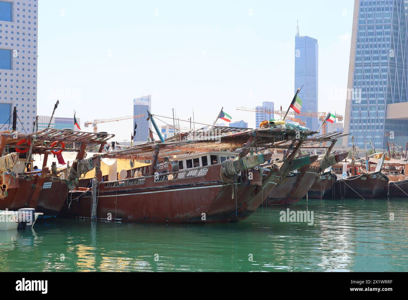 Towers and ships in Kuwait City Stock Photo - Alamy
