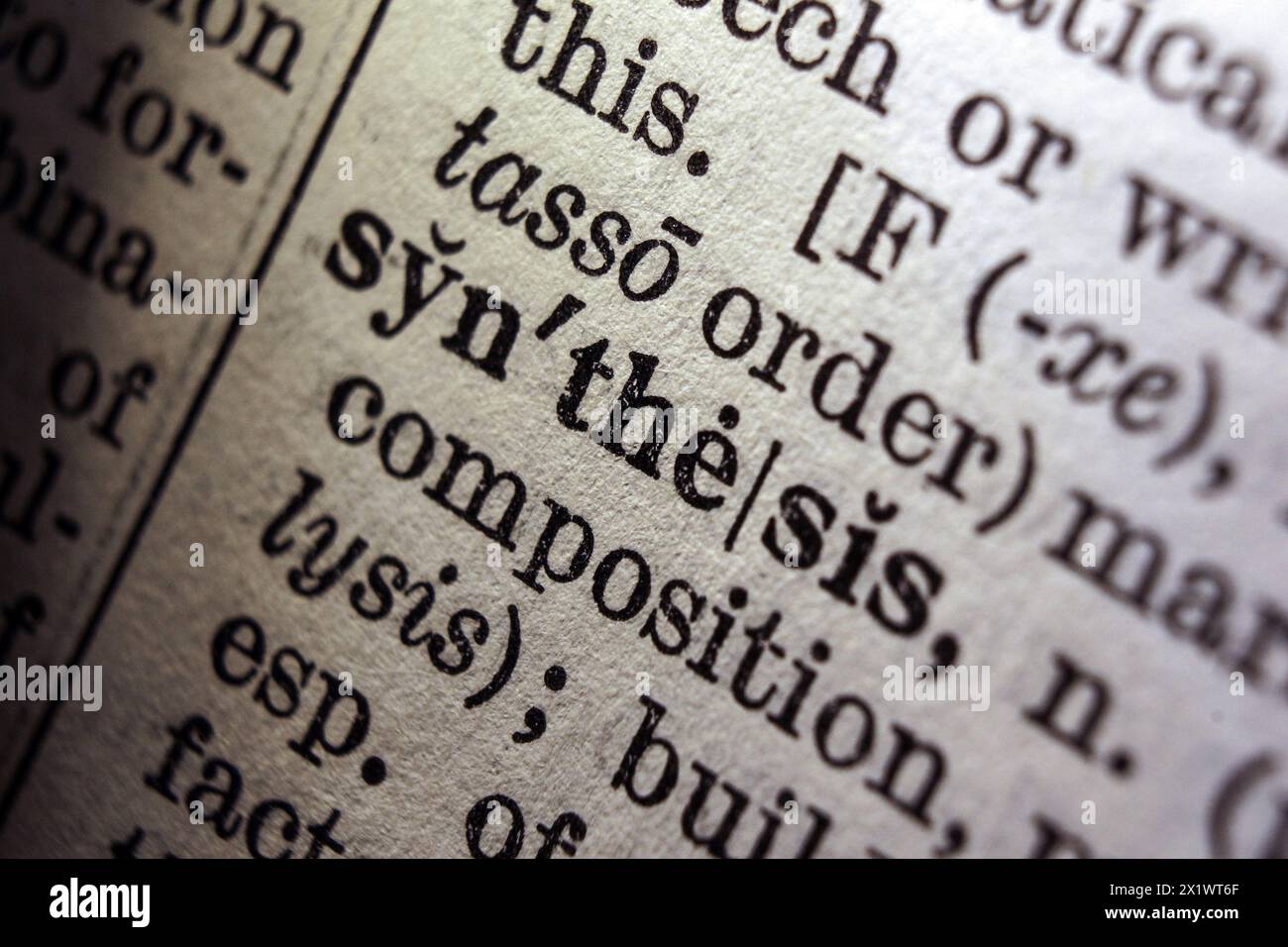 Word synthesis on dictionary page, macro close-up Stock Photo - Alamy