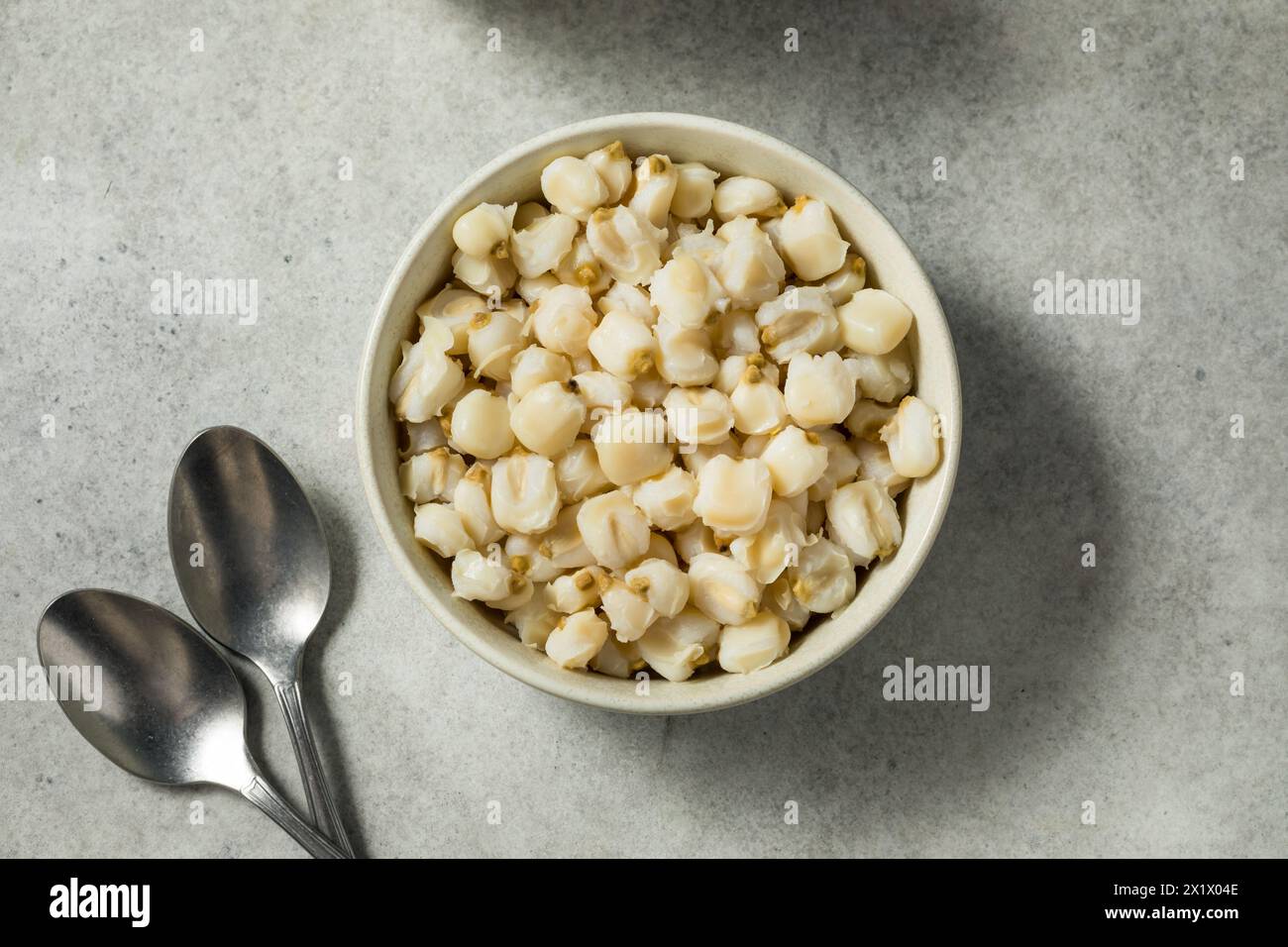 Raw Cooked White Mexican Hominy Corn in a Bowl Stock Photo - Alamy