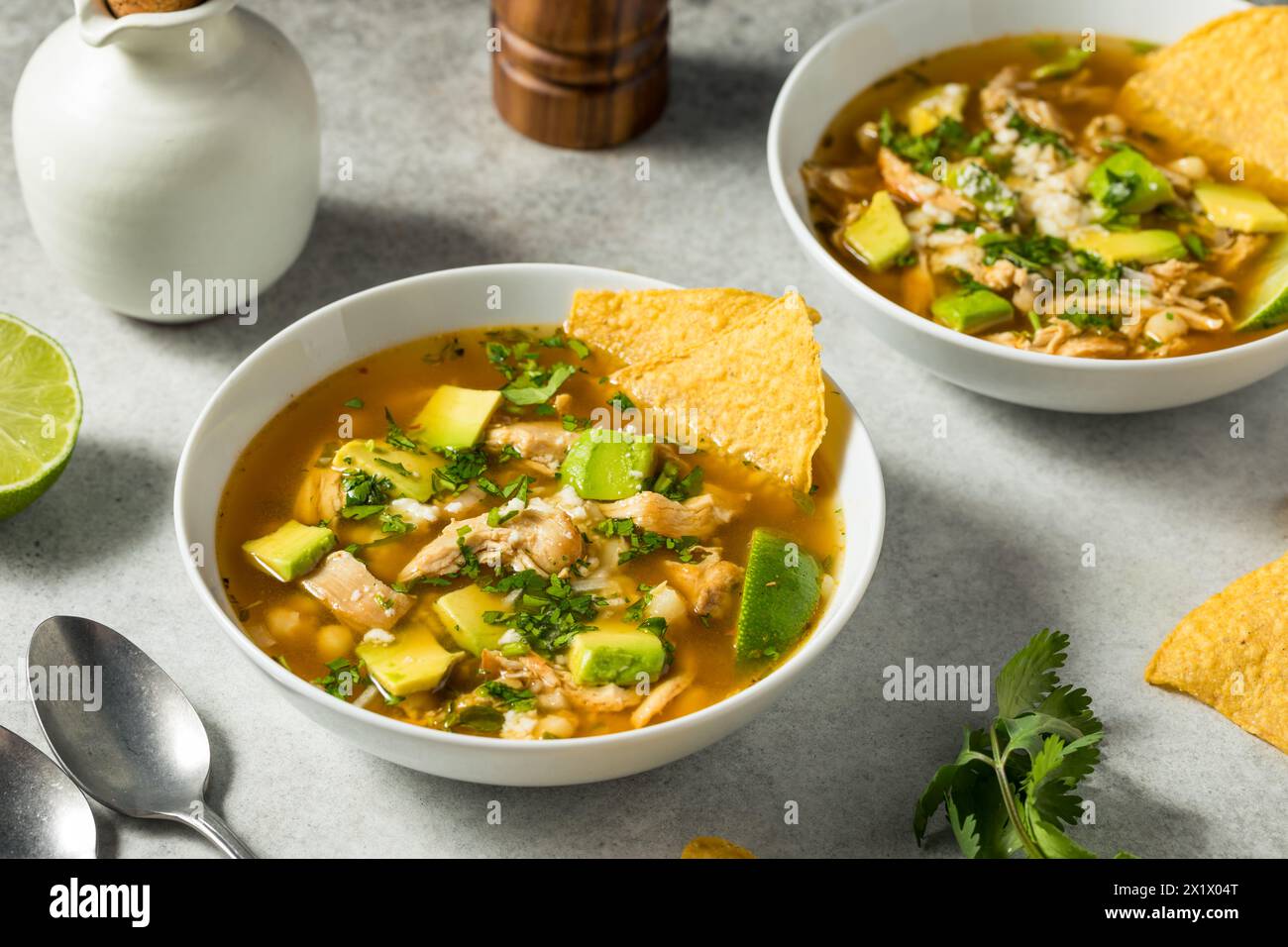 Homemade Mexican Chicken Pozole Soup with Tortilla Chips Stock Photo ...